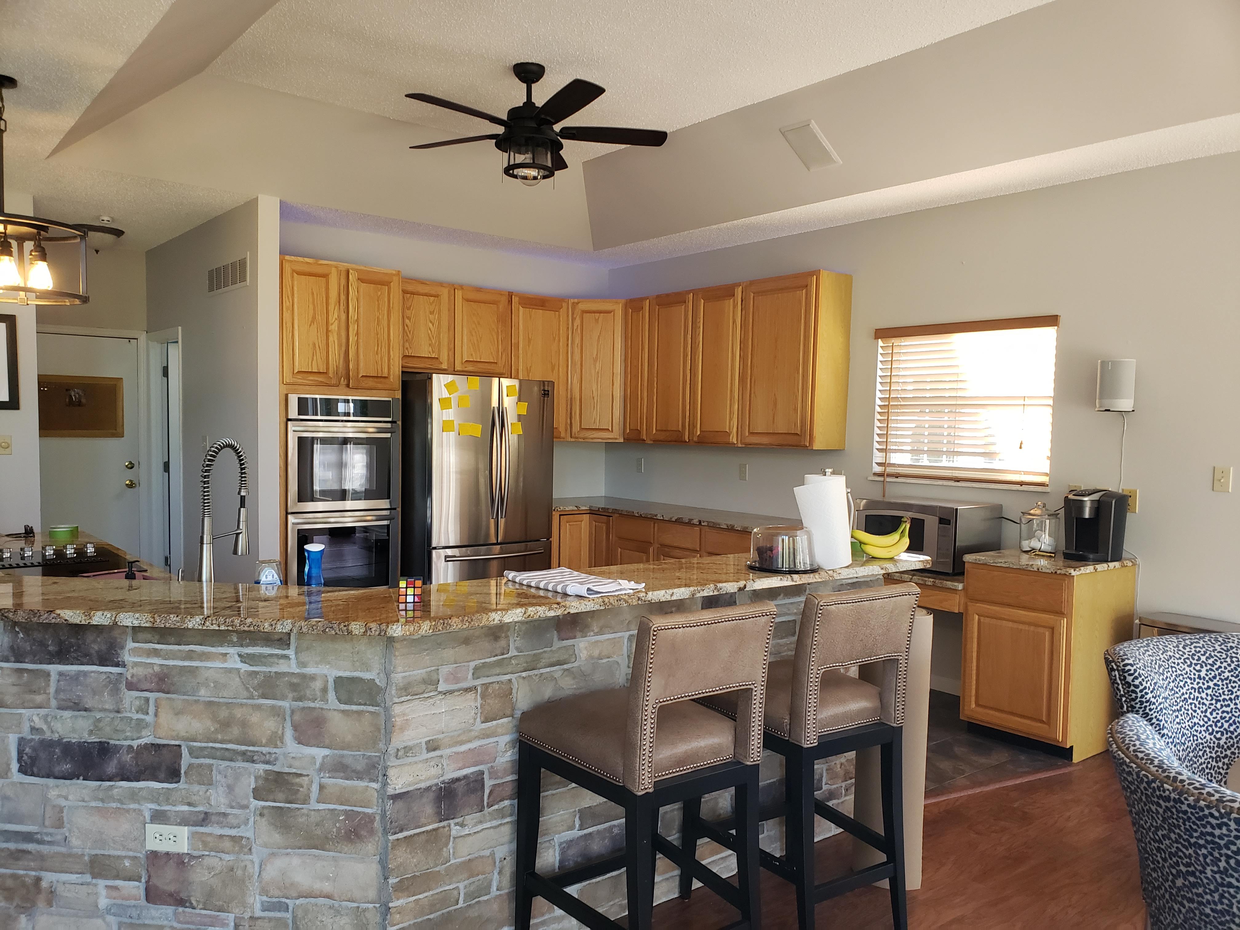Regent Blue, Beveled Shaker, Wine Cubes, Stacked Cabinets, Black Hardware